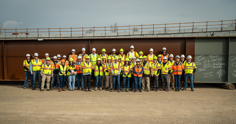 I-69 Finish Line team signs beam for I-69/I-465 Interchange